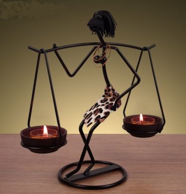 China Creative African Girls Iron Figure Candle Holder for Home Decoration supplier